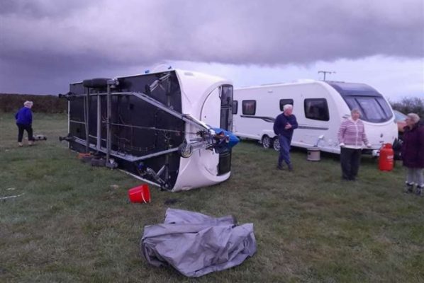 Strong winds flip caravan onto its side at campsite - Van Life Matters